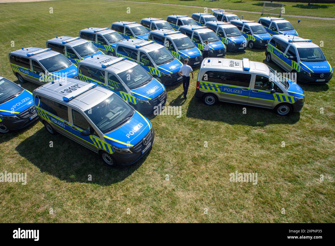 Magdeburg, Germany. 07th Aug, 2024. Police vehicles stand side by side ...