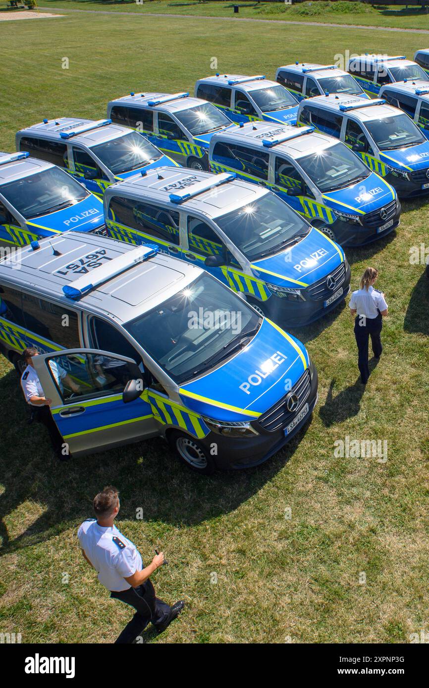 Magdeburg, Germany. 07th Aug, 2024. Police vehicles stand side by side ...