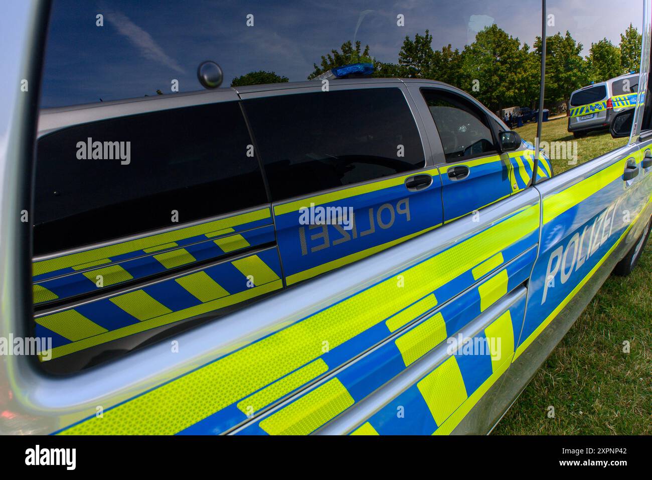 Magdeburg, Germany. 07th Aug, 2024. Police vehicles stand side by side ...