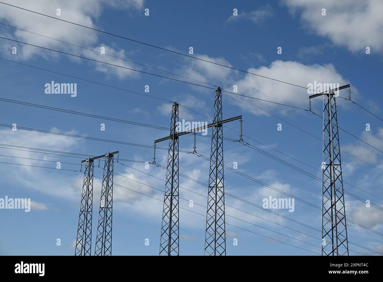 Transmission line pylon towers with cross arms, overhead lines, wires ...