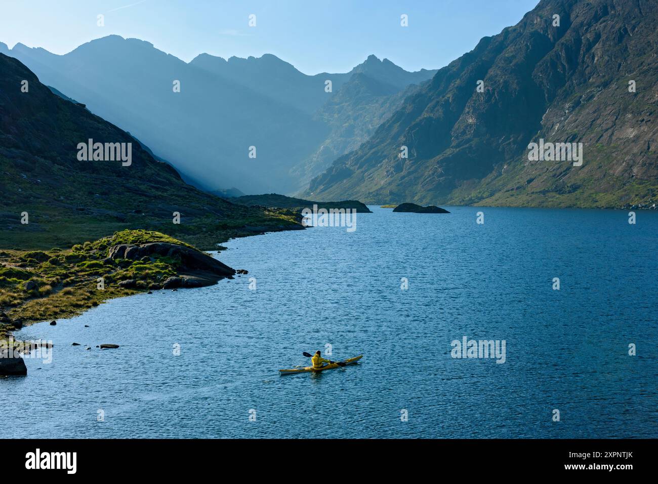 A kayaker on loch Coruisk In the Cuillin mountains, Isle of Skye ...