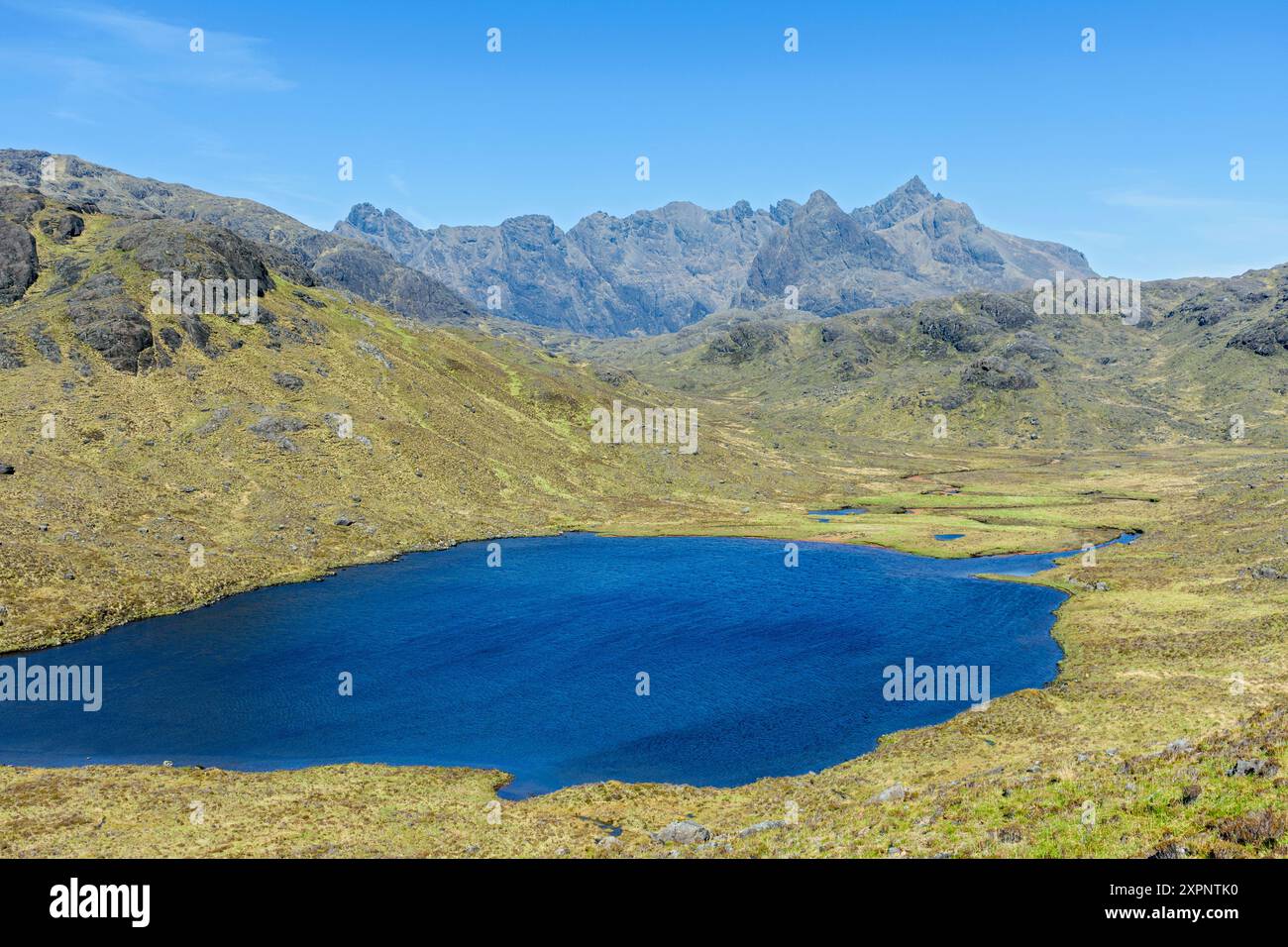 Loch a' Choire Riabhaich with the northern peaks of the Cuillin ...