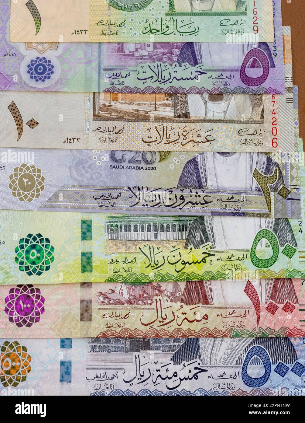 Kingdom of Saudi Arabia various denomination banknotes closeup Stock ...