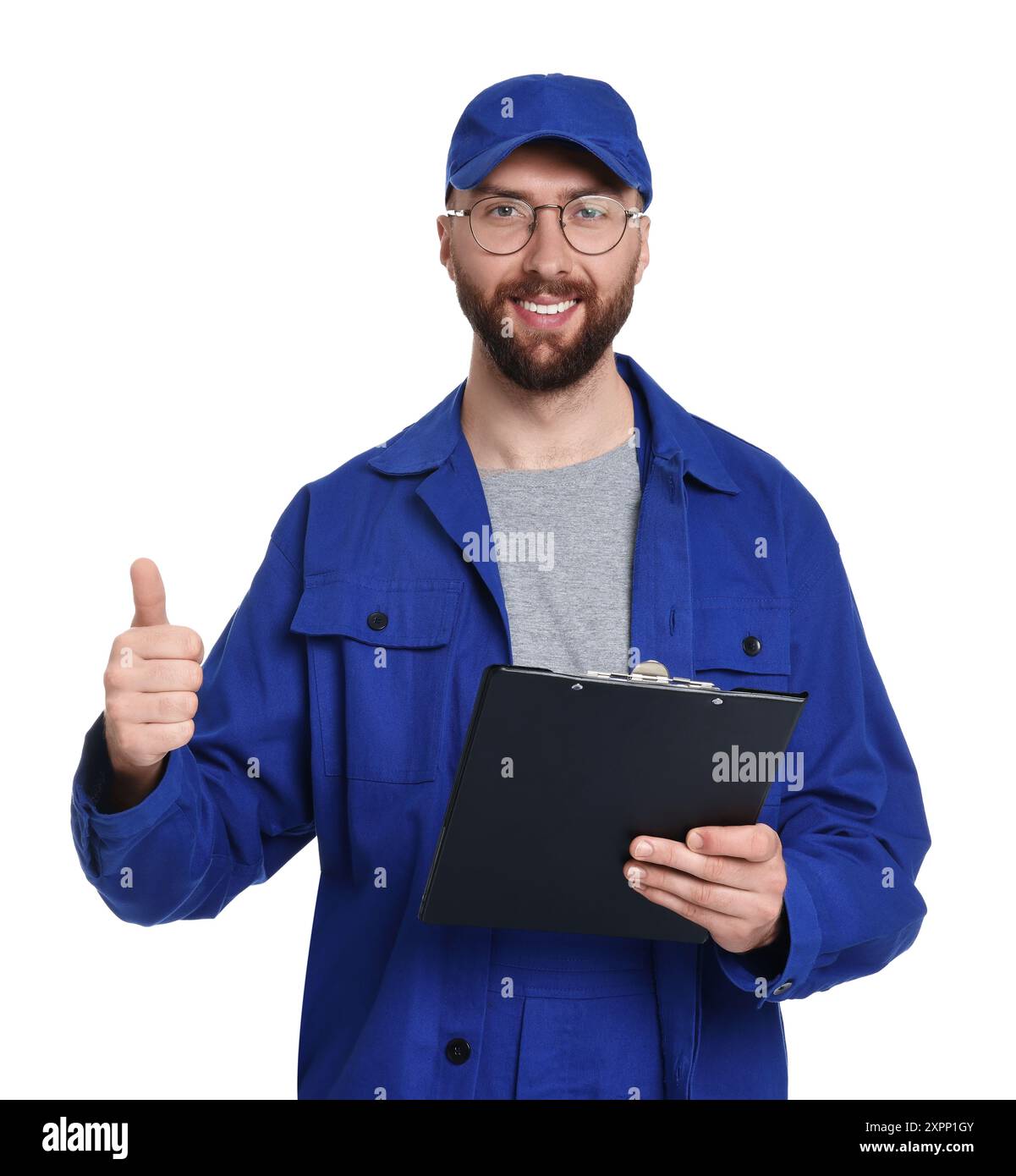 Professional auto mechanic with clipboard showing thumbs up on white ...