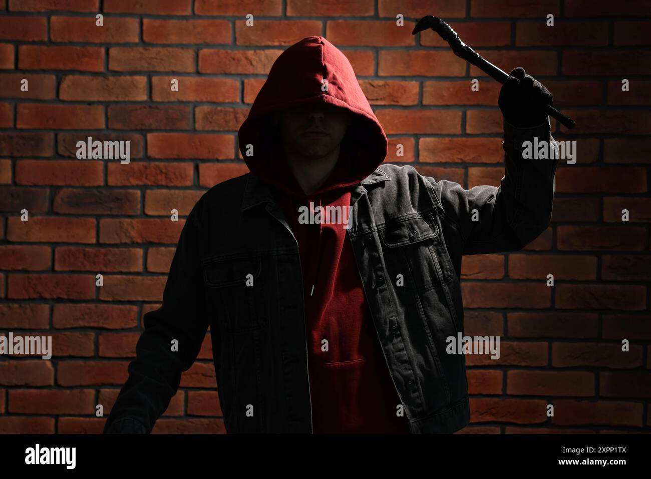 Thief crowbar in hand hi-res stock photography and images - Alamy