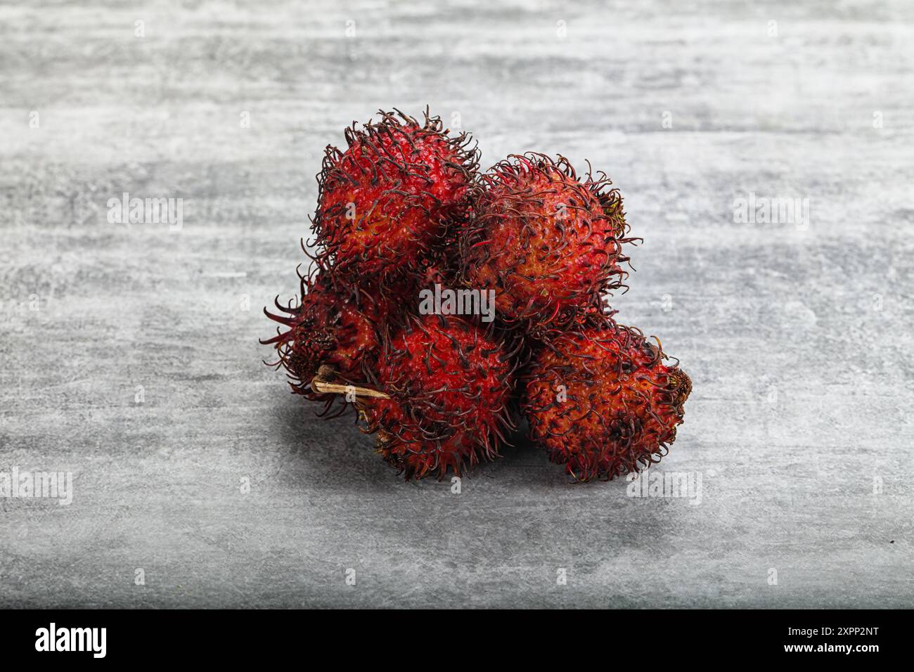 Sweet ripe juicy hairy Rambutan fruit Stock Photo - Alamy
