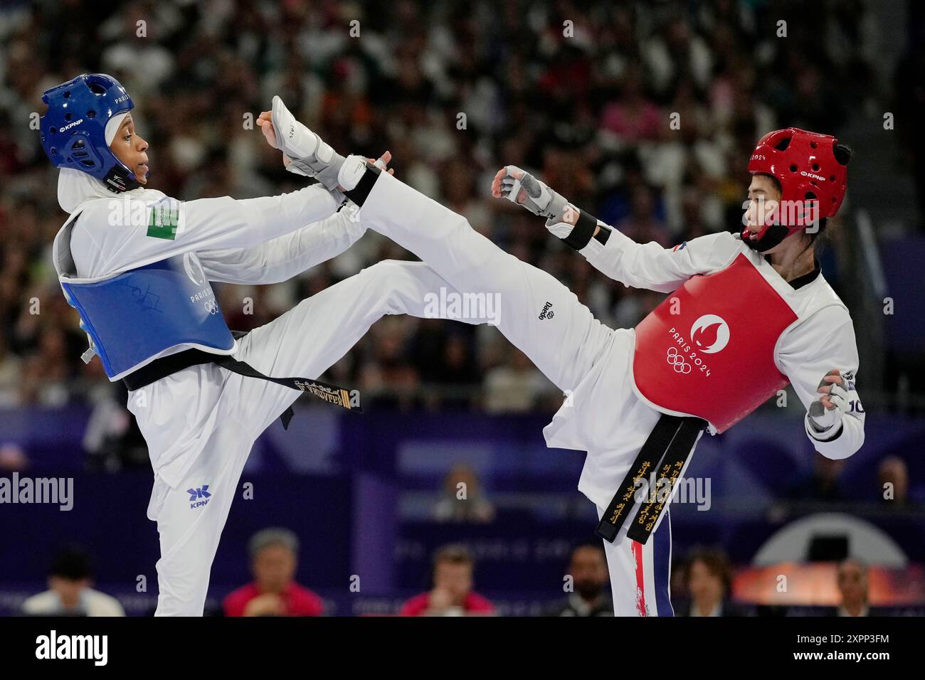 Saudi Arabia's Dunya Ali M Abutaleb competes with Thailand's Panipak ...