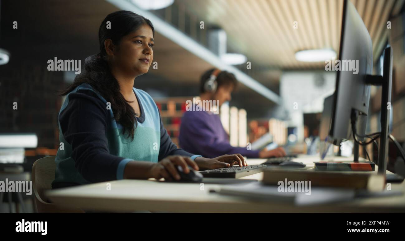 Thoughtful Indian Female Student Working on Personal Development in a ...