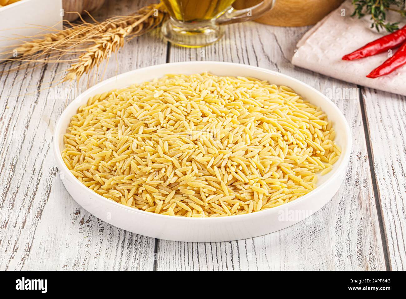 Italian raw dry pasta risoni for cooking Stock Photo - Alamy