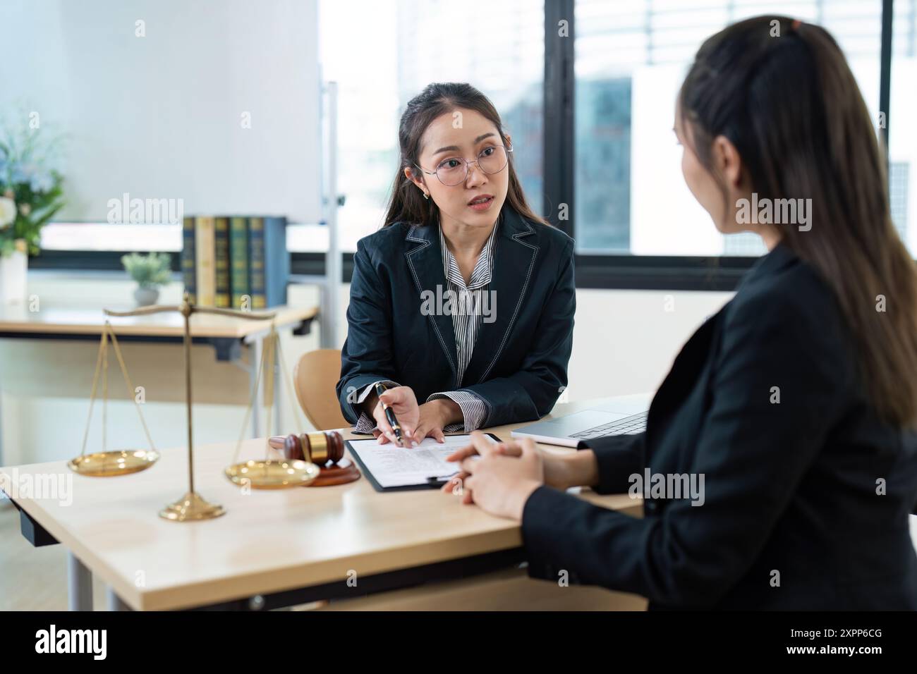 Professional Female Lawyer Consultation Client in Modern Office with ...