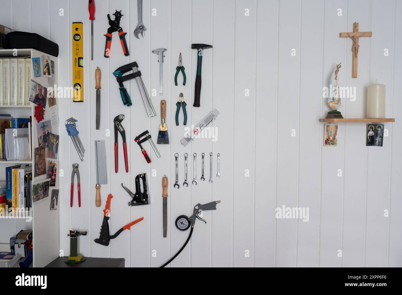 tools on the wall of a living room, also as decoration Stock Photo - Alamy