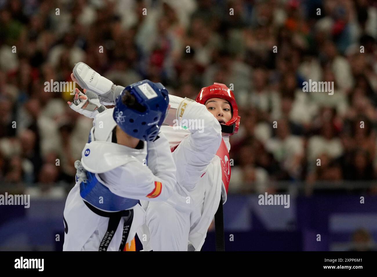 Spain's Adriana Cerezo Iglesias competes with Iran's Mobina Nematzadeh ...