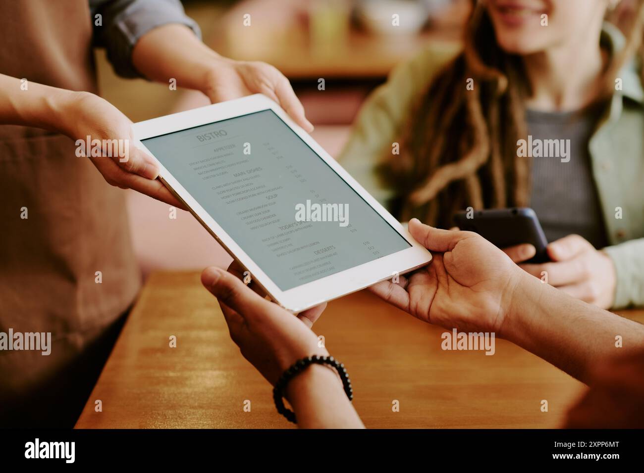 Handing out food restaurant hi-res stock photography and images - Alamy