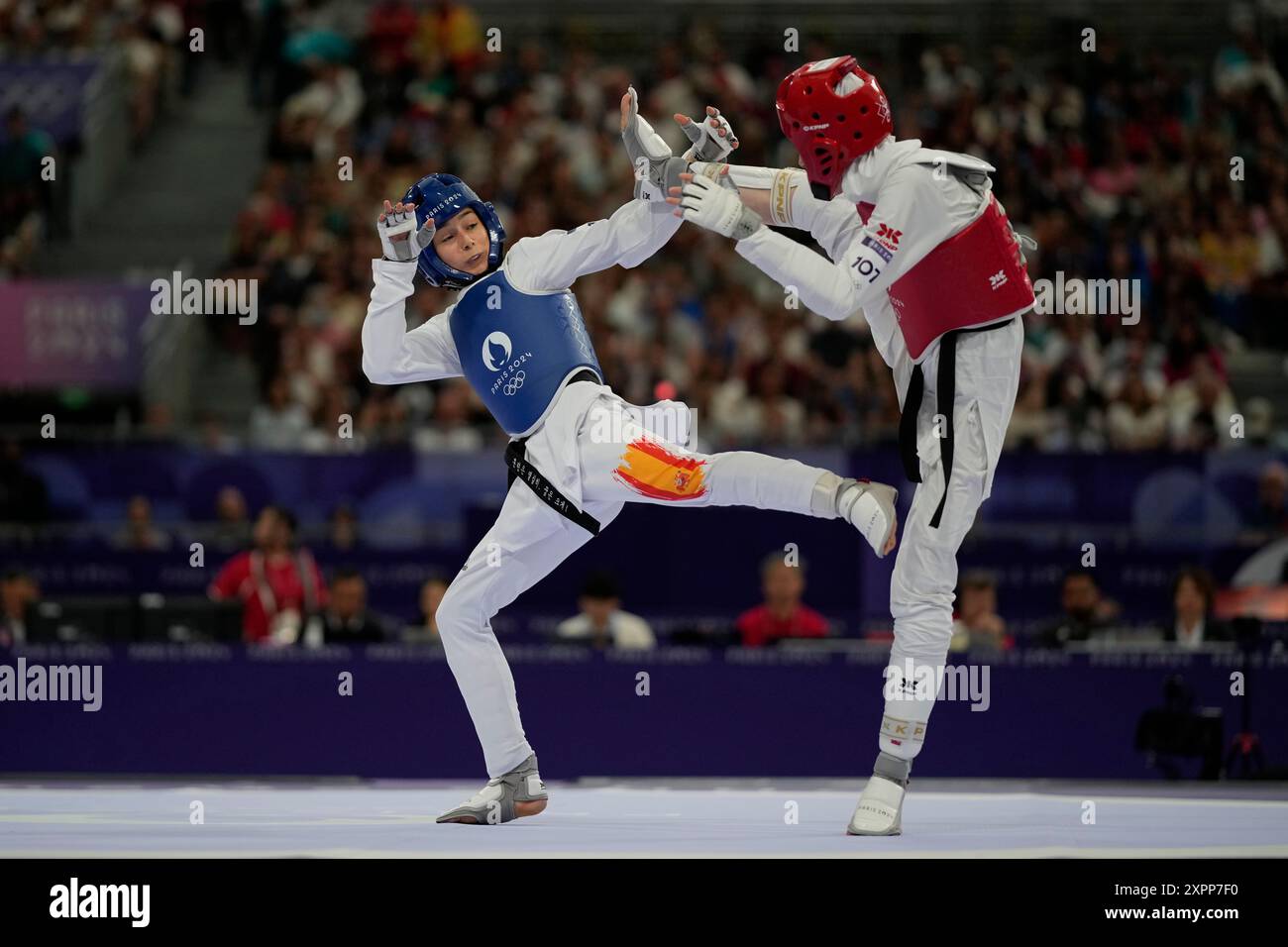 Spain's Adriana Cerezo Iglesias competes with Iran's Mobina Nematzadeh ...