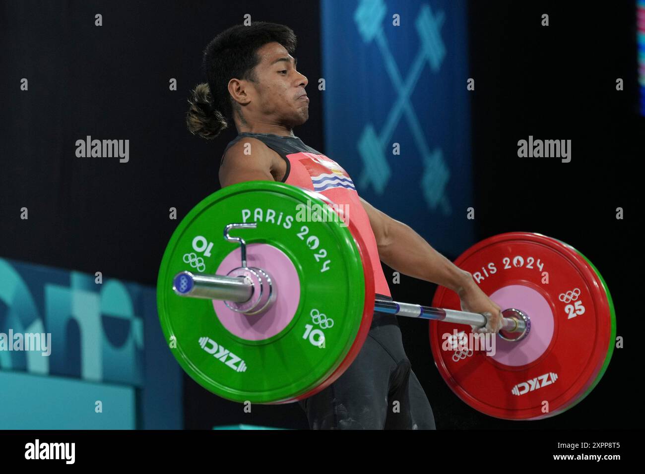 Kaimauri Erati of Kiribati competes in the men's 61kg weightlifting ...