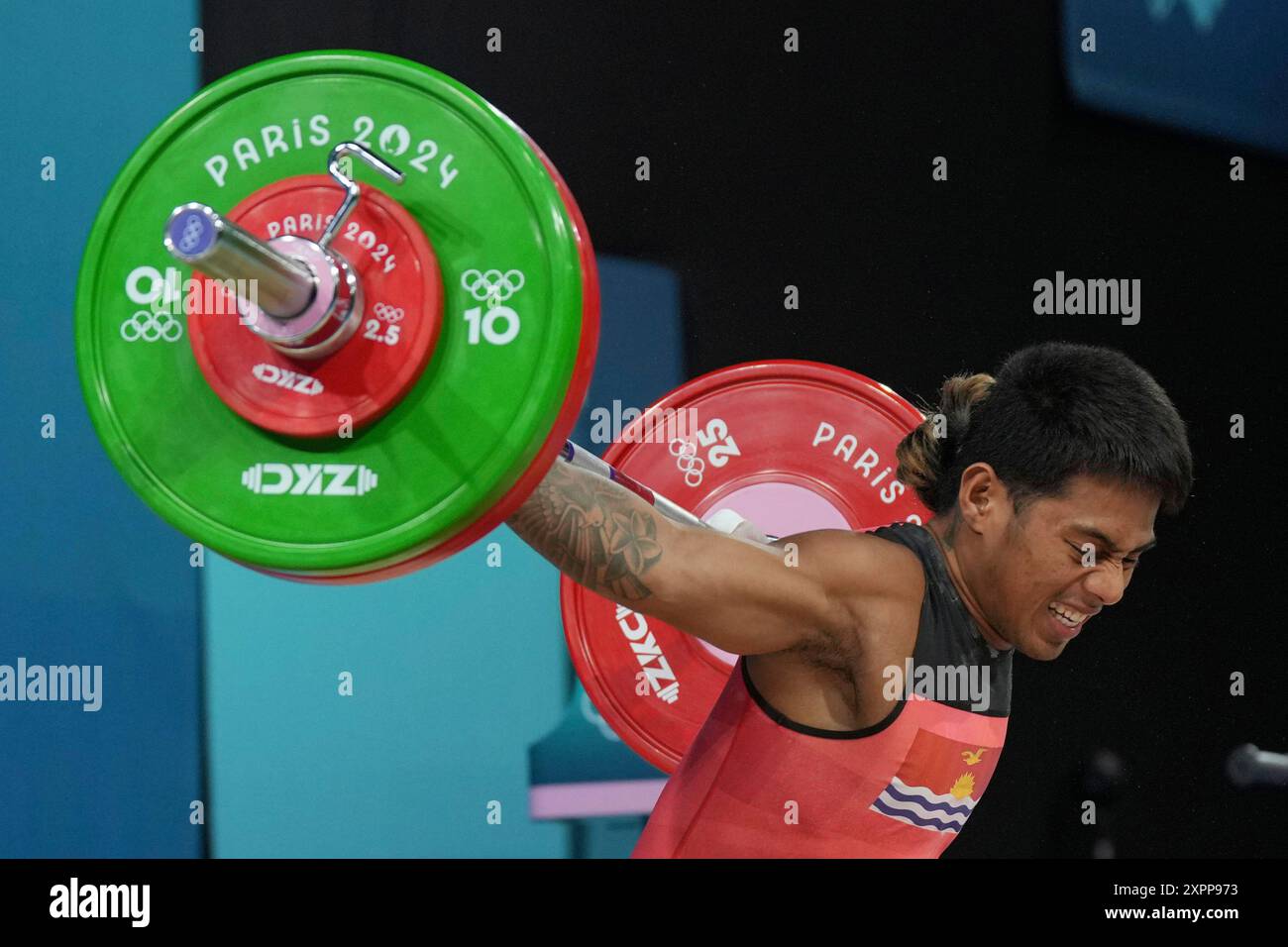 Kaimauri Erati of Kiribati competes during the men's 61kg weightlifting ...