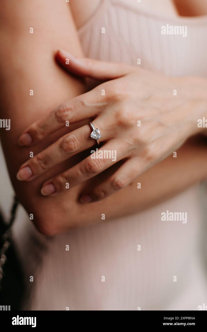 Hand silver ring on finger hi-res stock photography and images - Alamy