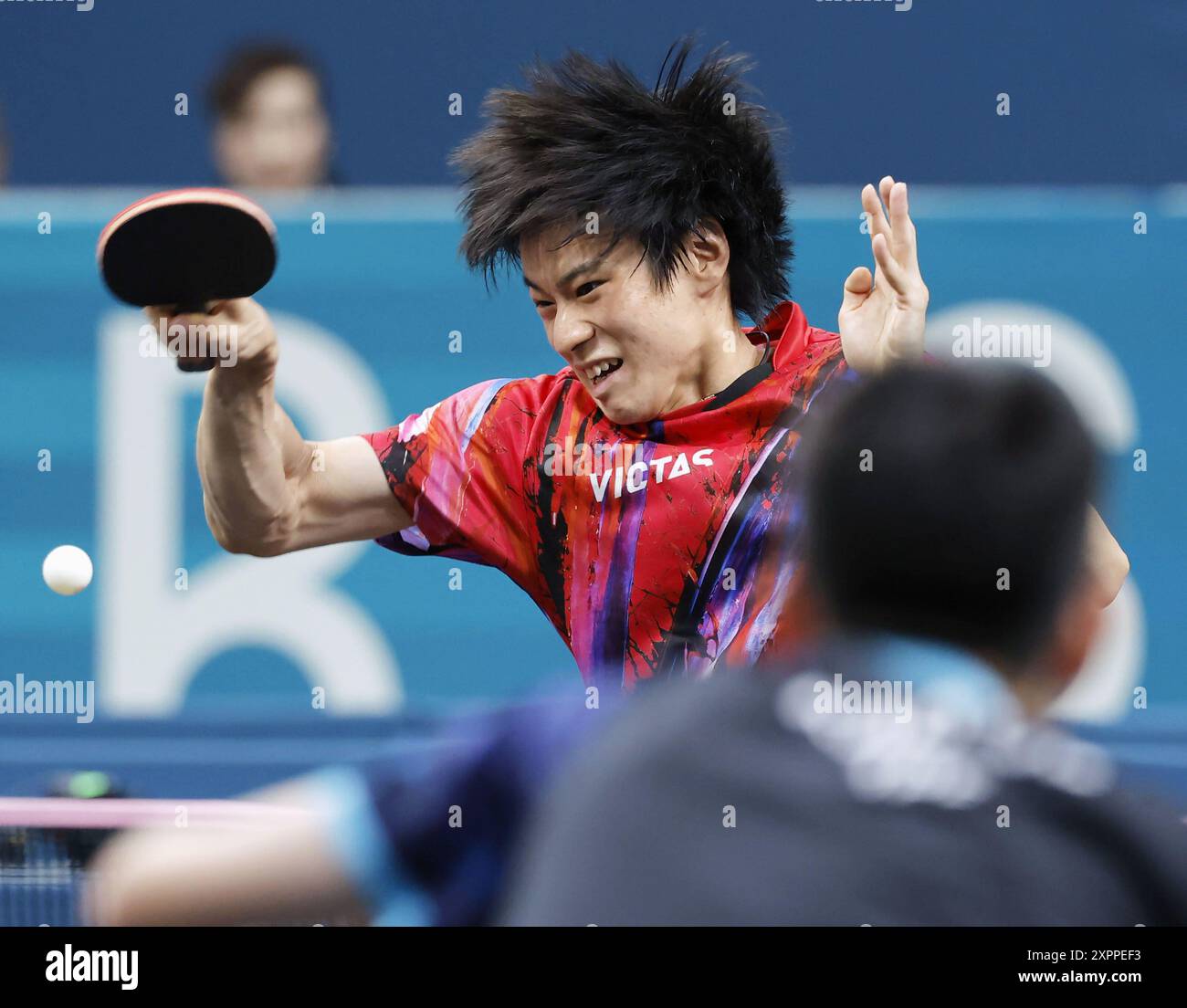 Japan's Shunsuke Togami competes against Taiwan's Kao Cheng-jui in the ...