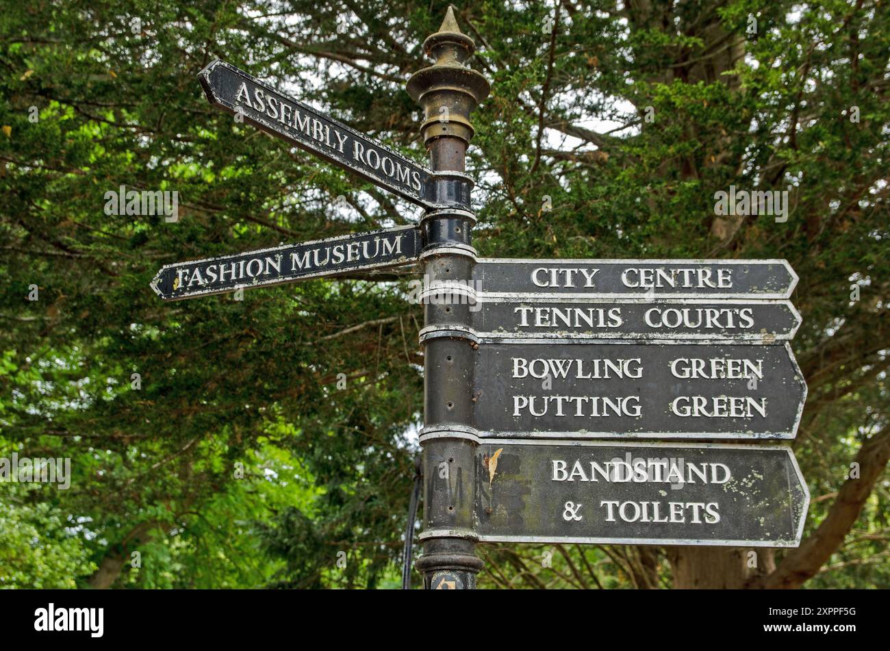 A fingerpost in Royal Victoria Park pointing pedestrians to various ...