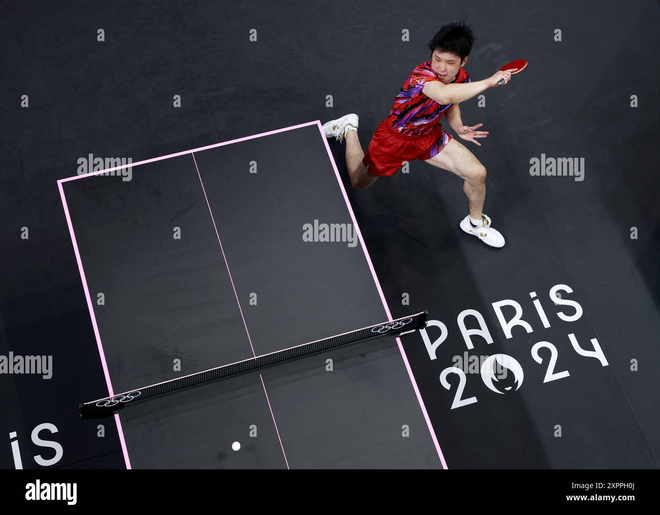 Japan's Shunsuke Togami competes against Taiwan's Kao Cheng-jui in the ...
