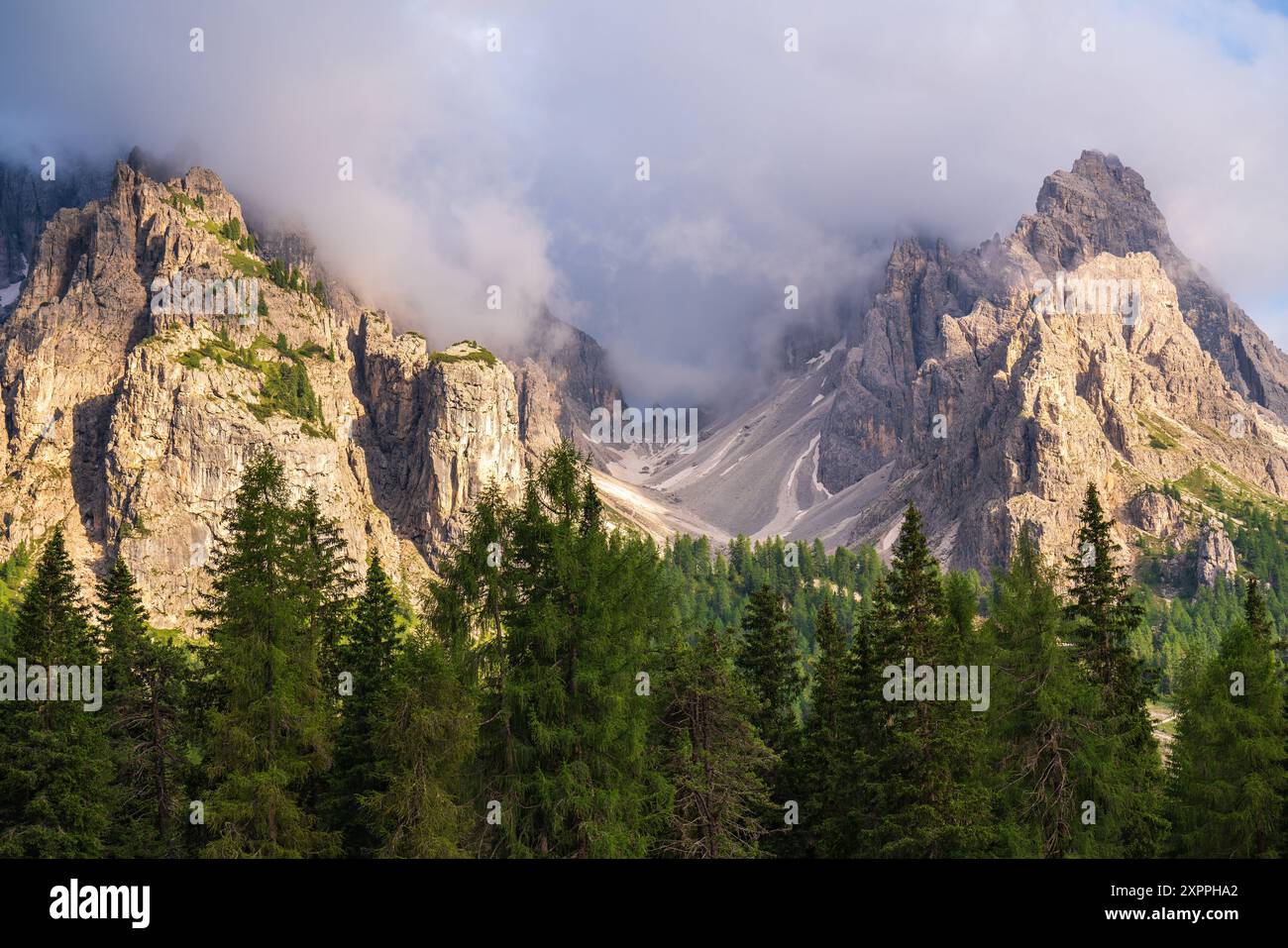 Huge mountains in clouds. Beautiful mountain landscape. Rocky peaks of ...