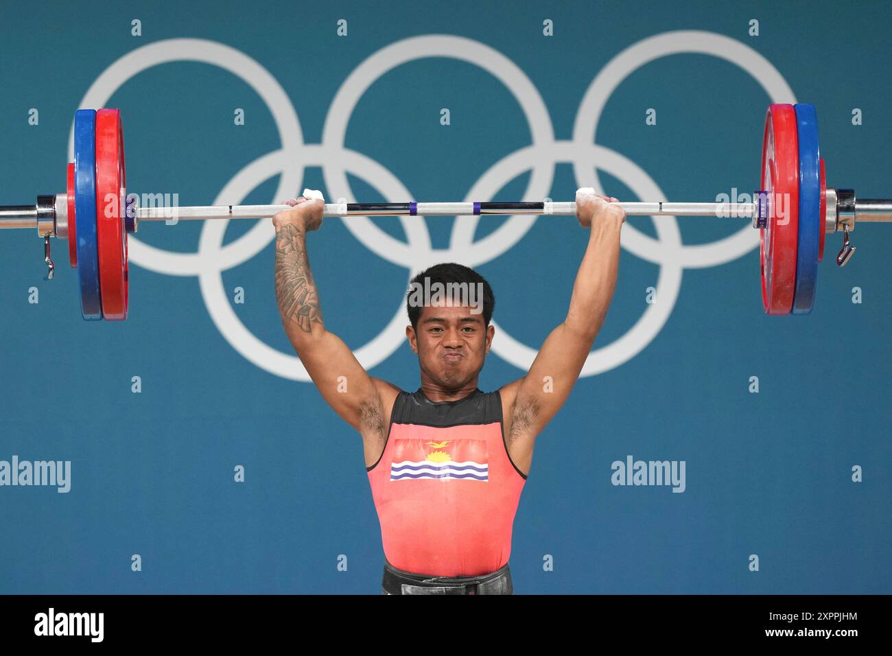 Kaimauri Erati of Kiribati competes during the men's 61kg weightlifting ...