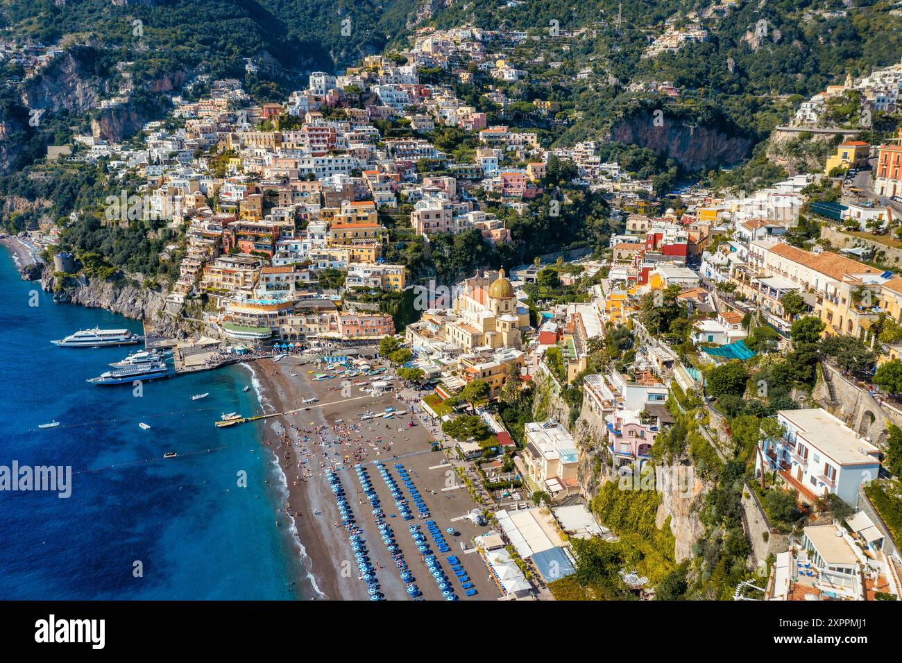 Aerial view of Positano with comfortable beach and blue sea on Amalfi ...
