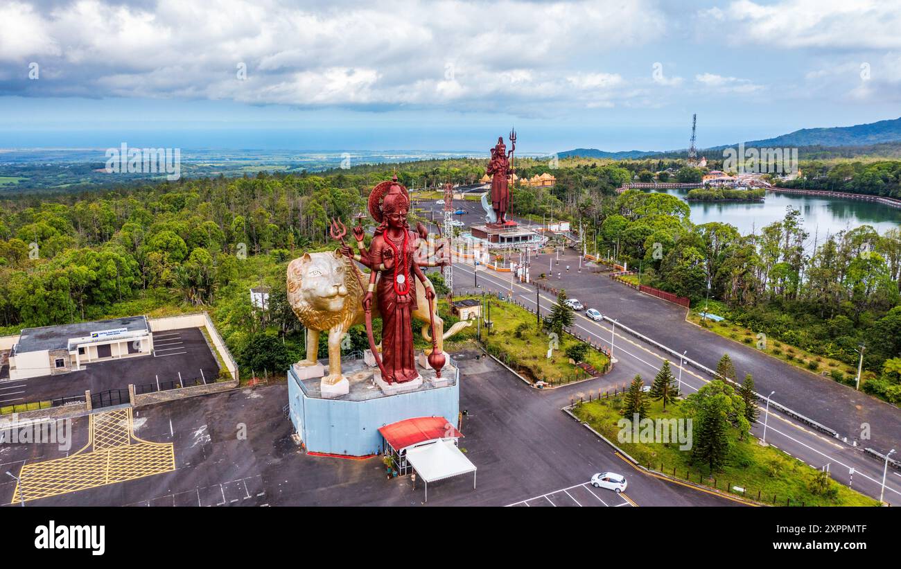 A powerful Statue of the Hindu goddess Durga Maa with a golden lion in ...