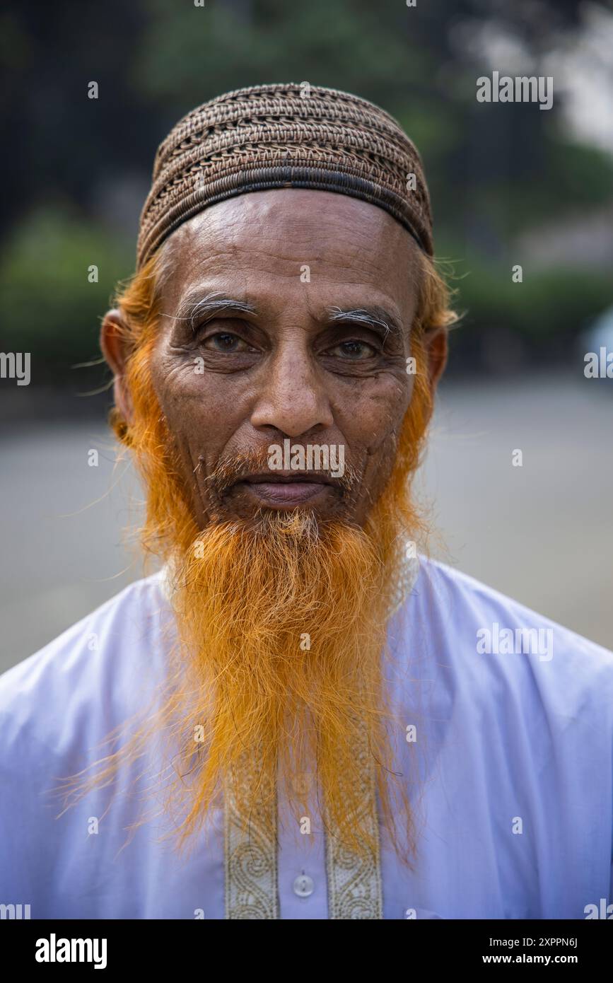 Portrait of a Muslim man with orange beard symbolizing that he has ...