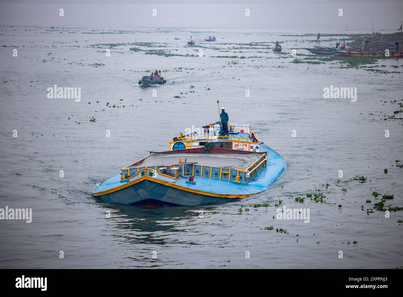 Fully loaded cargo ship on the Dakatiya River, Chandpur, Chandpur ...