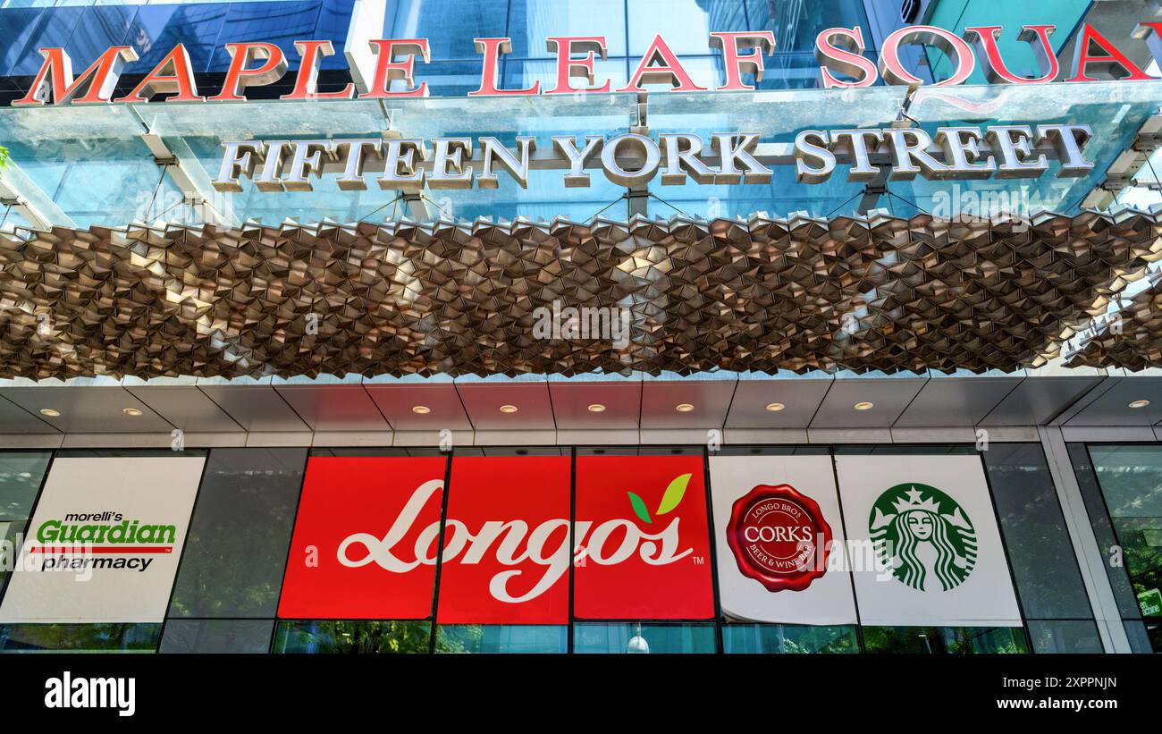 Toronto, Canada - August 5, 2024: Low-angle view of the entrance to Maple Leaf Square. Sign of ...
