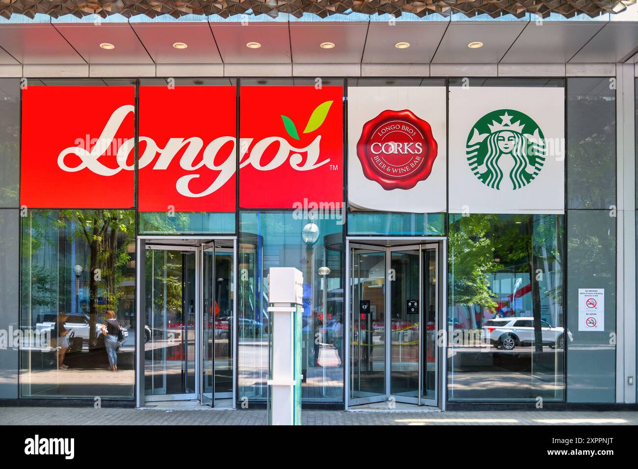 Toronto, Canada - August 5, 2024: Diverse business signs at the ...