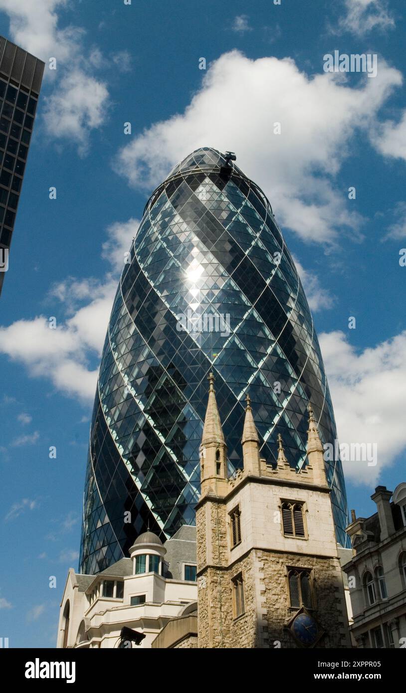 30 St Mary Axe The Gherkin building and St Andrew Undershaft Church ...