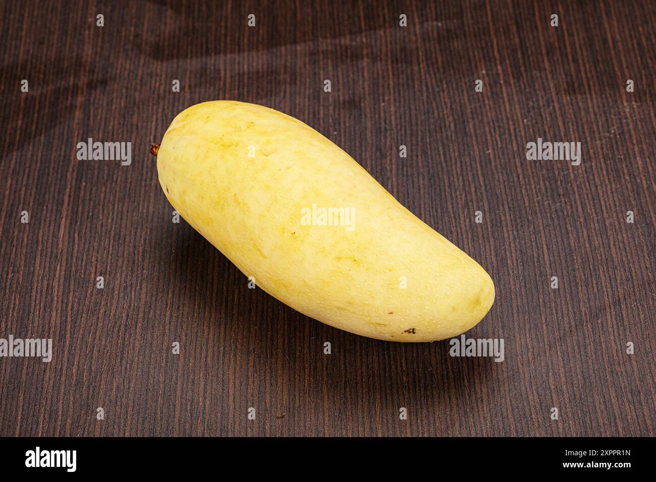 Tropical exotic fruit - ripe yellow mango Stock Photo - Alamy