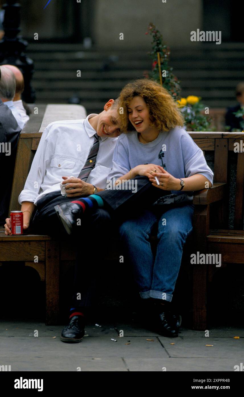 Lunchtime lovers, two young office works flirting with each other in ...