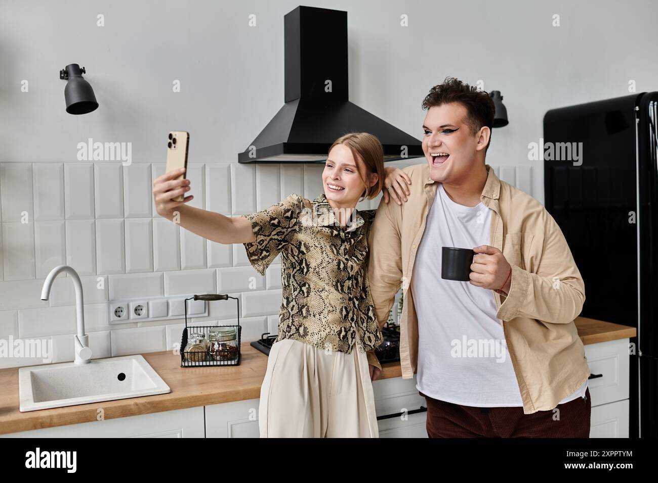 Woman joyfully capturing moment hi-res stock photography and images - Alamy