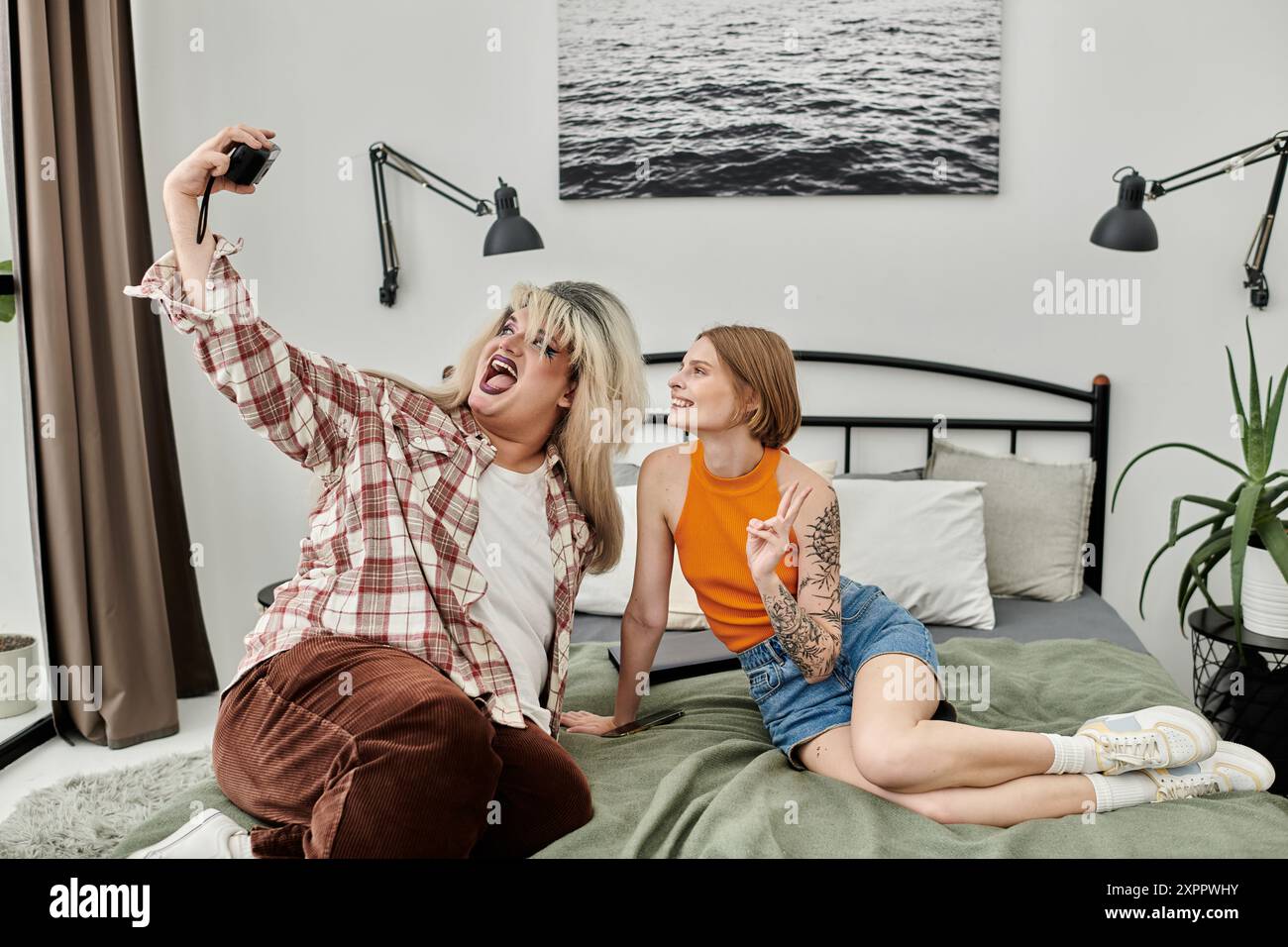 A joyful moment captured between two friends sharing laughter and ...