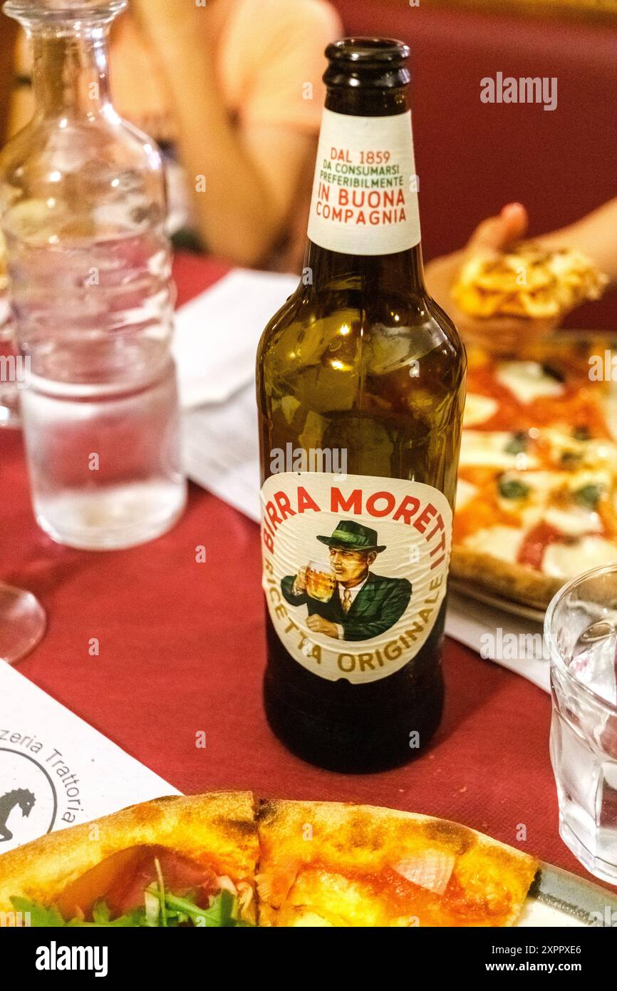 Trieste, Italy 28-7-2024 : Bottle of Moretti beer next to an Italian ...