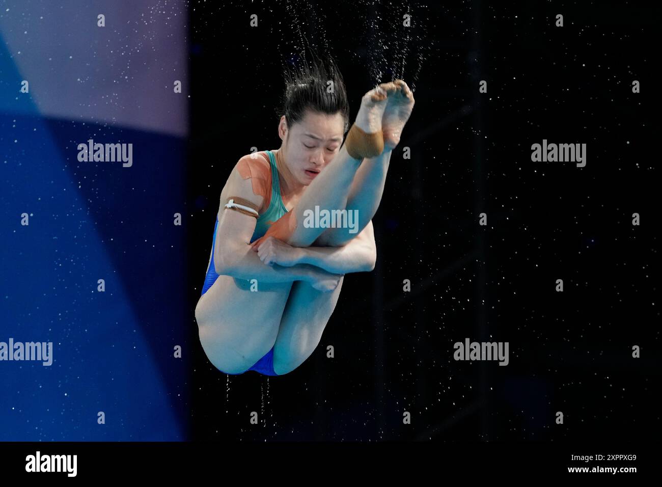 China's Chang Yani competes in the women's 3m springboard diving ...