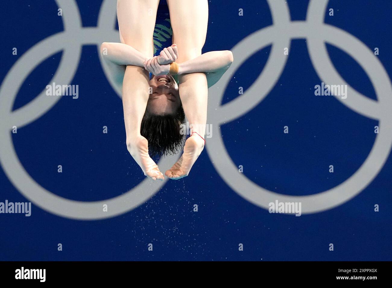China's Chen Yiwen competes in the women's 3m springboard diving ...