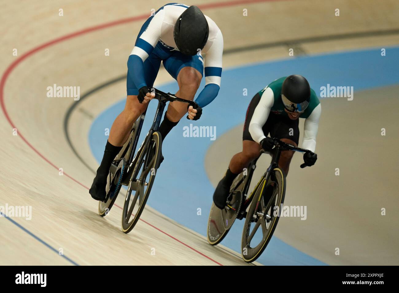 Mikhail Yakovlev of Israel, left, competes during alongside Jair Tjon ...