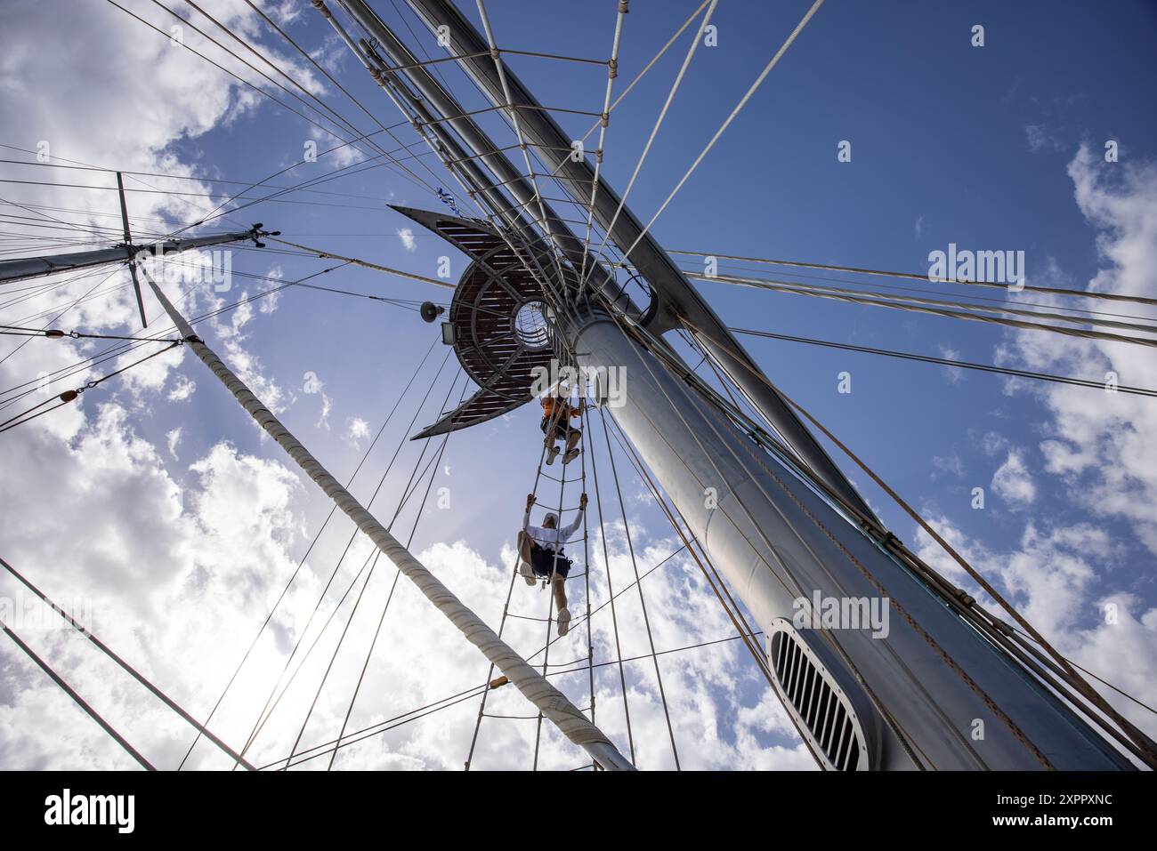 Mast climbing activity for passengers on board the sailing cruise ship ...