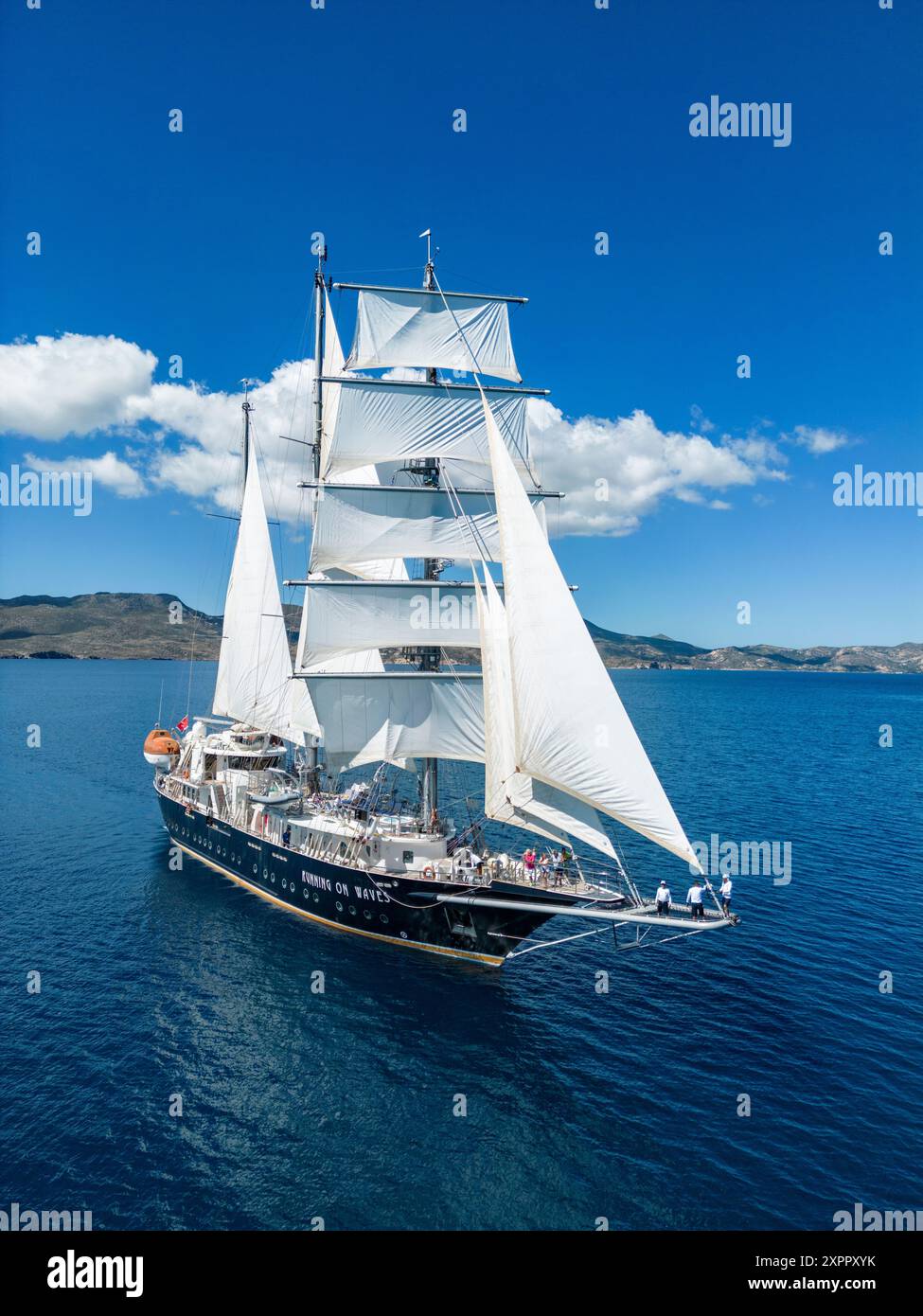 Aerial view of sailing cruise ship Running on Waves (M'Ocean) under ...