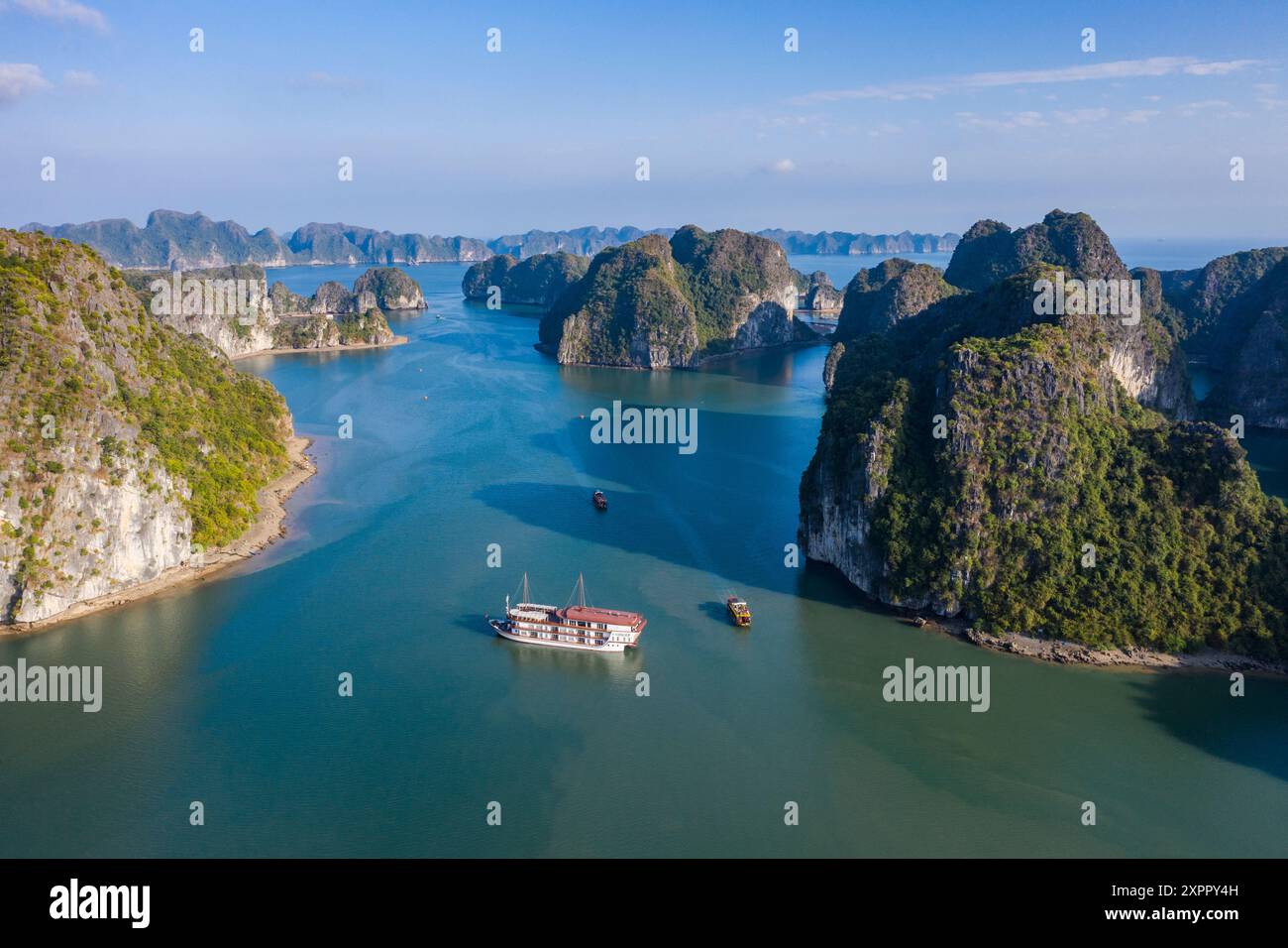Aerial view of cruise ship Ginger (Heritage Line) in a bay surrounded ...