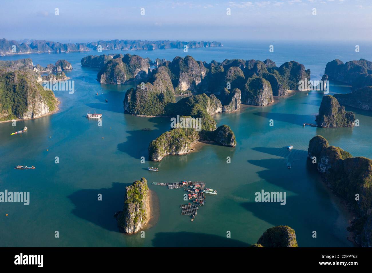 Aerial view of cruise ship Ginger (Heritage Line) and fishing village ...