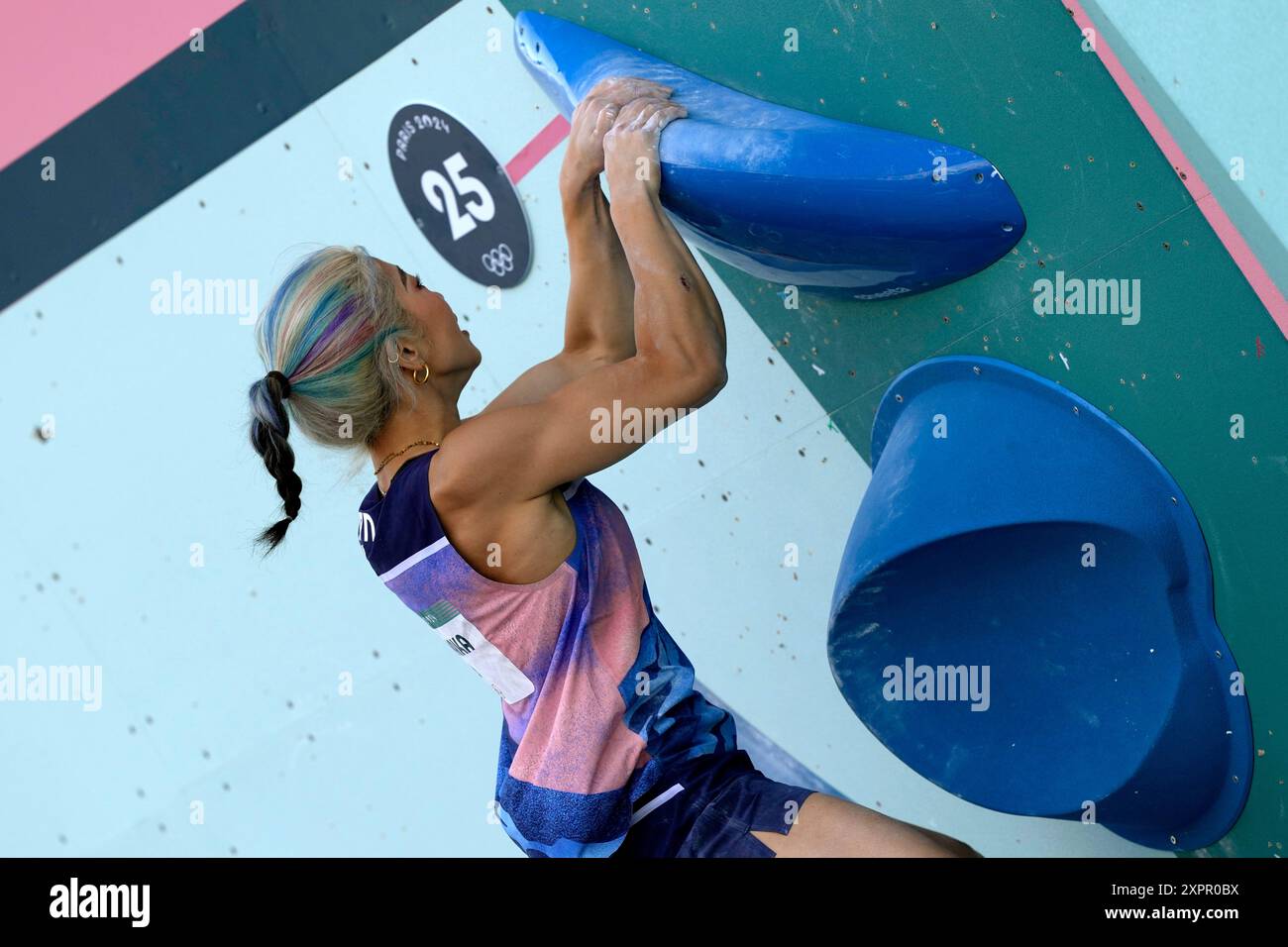 Miho Nonaka of Japan competes in the women's boulder and lead, semi ...