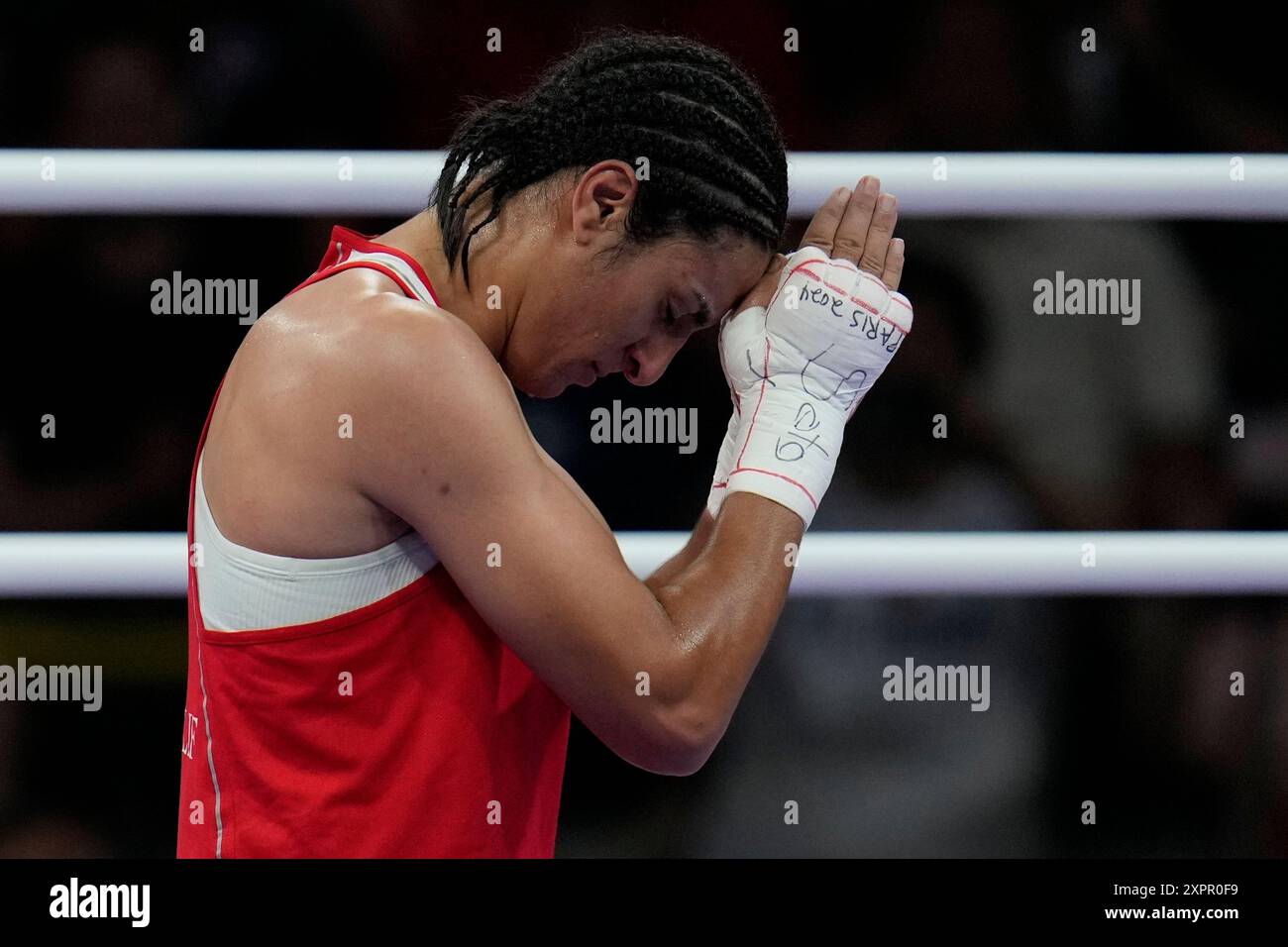 Algeria's Imane Khelif, celebrates after defeating Hungary's Anna ...
