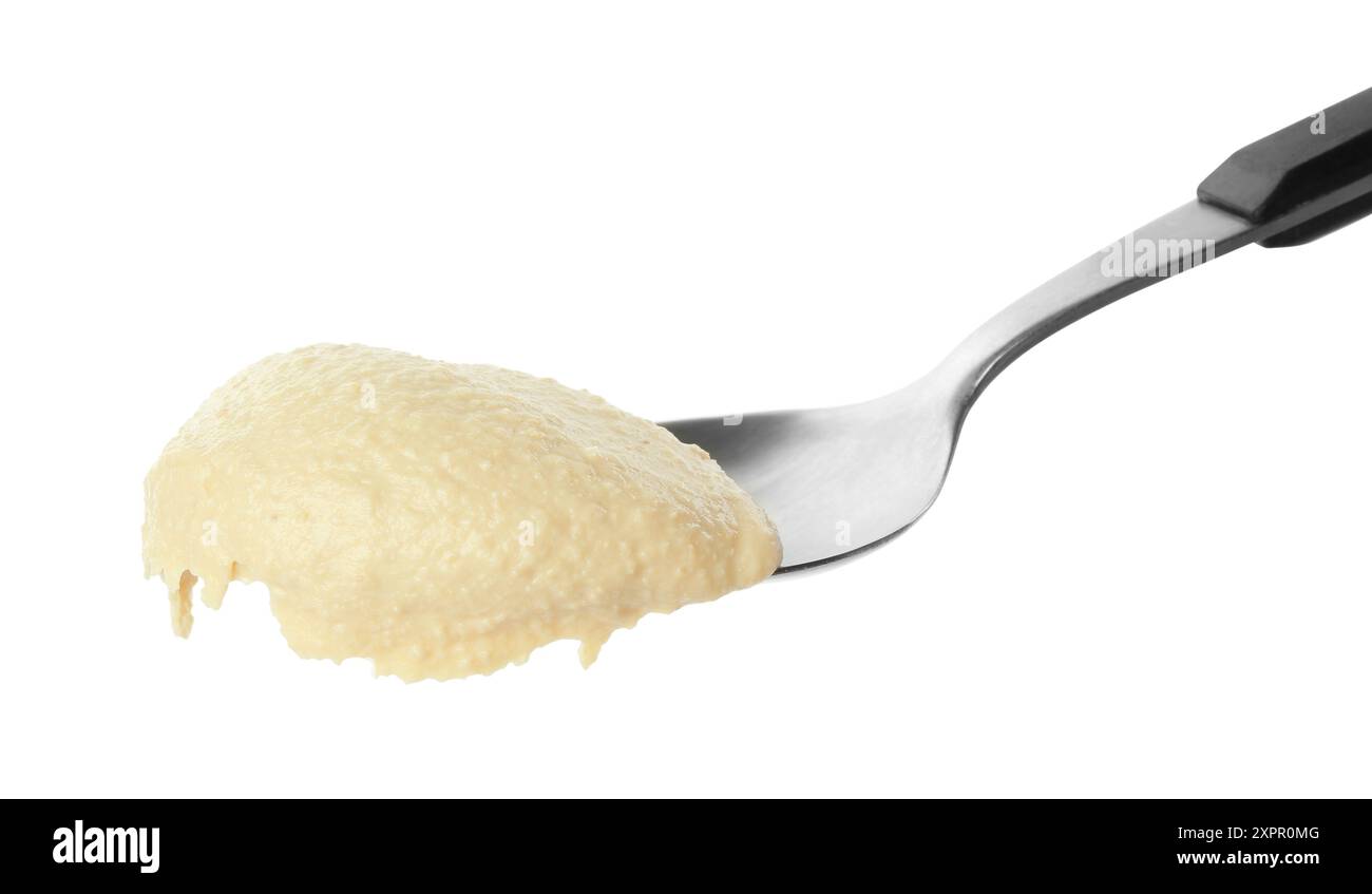 Spoon with delicious hummus isolated on white Stock Photo - Alamy