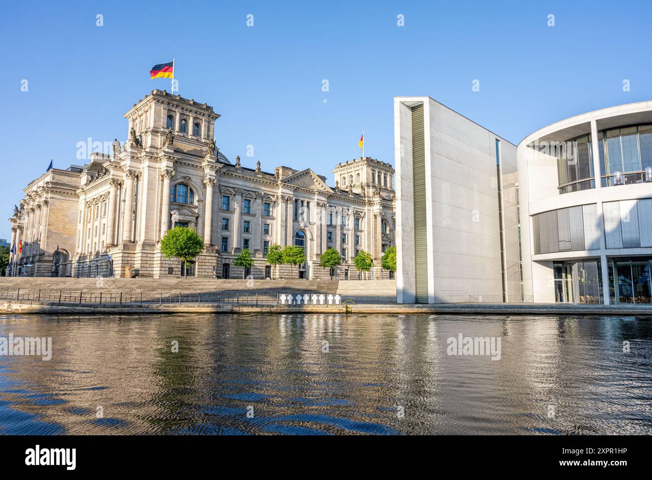 The historic Reichstag and a part of the modern government buildings at ...