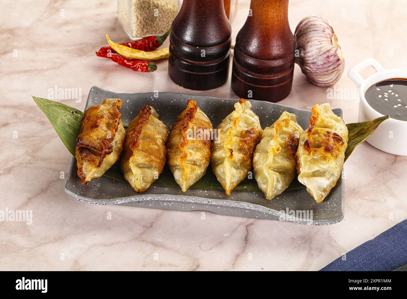 Fried Japanese stuffed dumplings - Gyoza with meat Stock Photo - Alamy